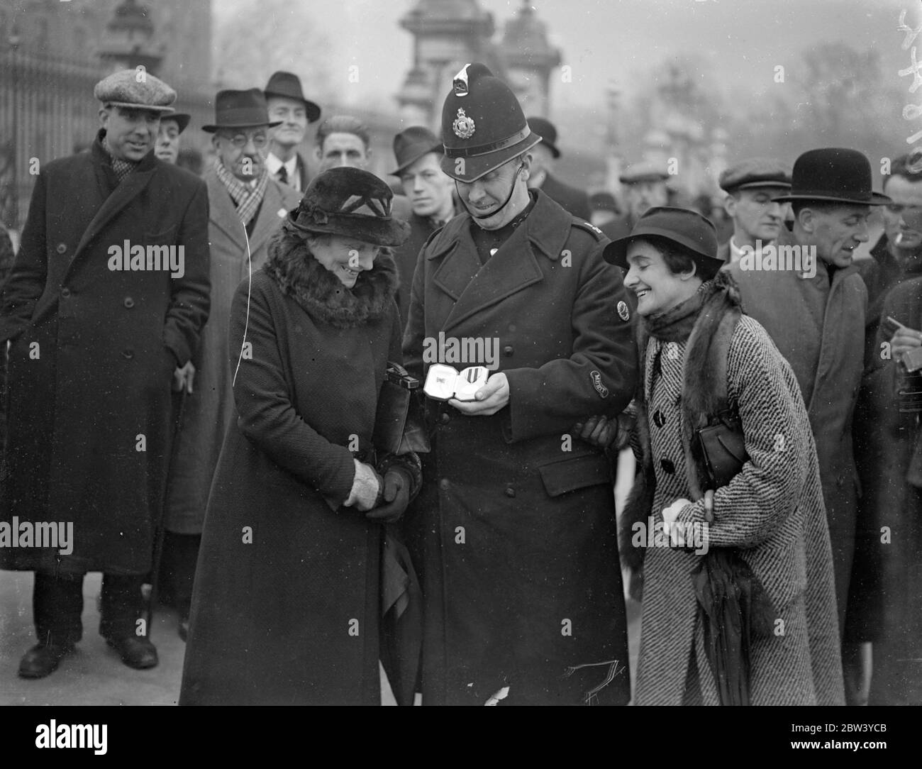 Man receiving medal Black and White Stock Photos & Images - Alamy