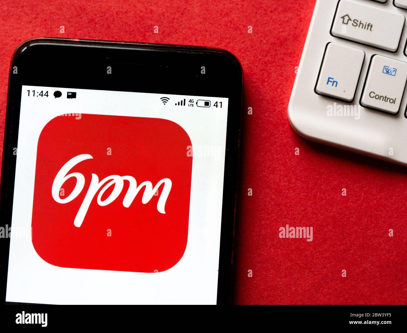 In this photo illustration a 6pm logo seen displayed on a smartphone ...