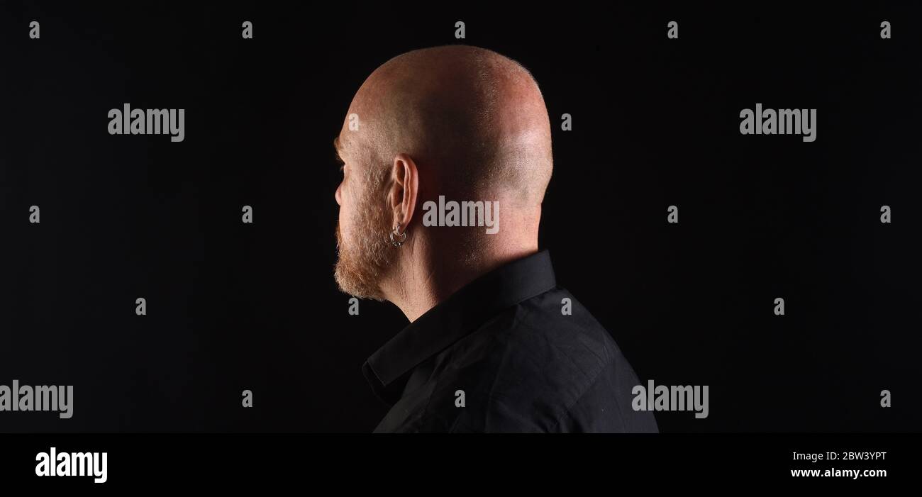 portrait of a man in low key, rear view of head Stock Photo - Alamy