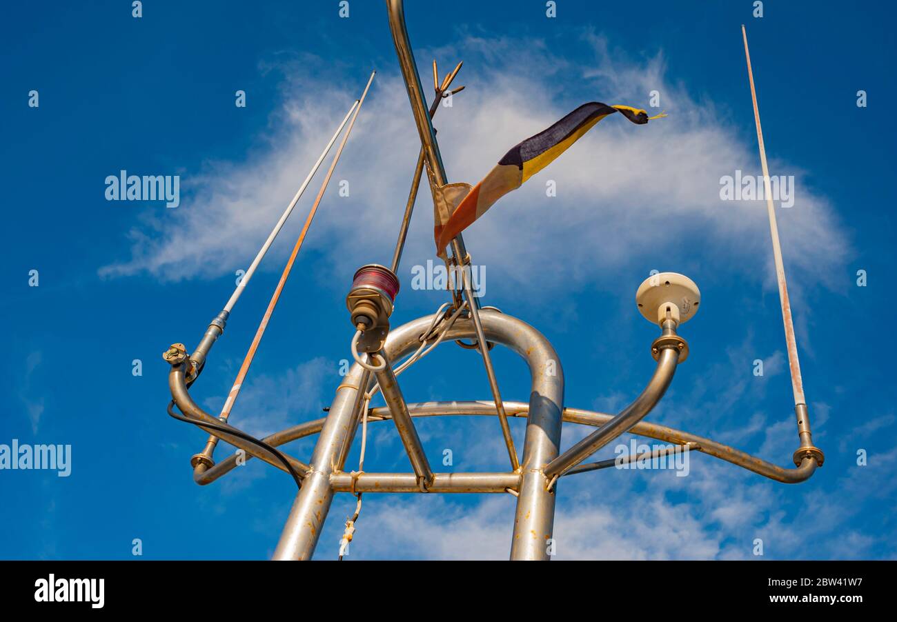 Ships antenna and navigation system in a clear blue sky Stock Photo - Alamy
