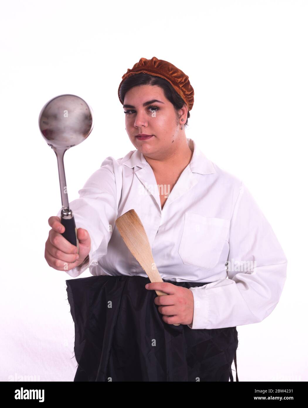 curvy chef girl prepairing food Stock Photo - Alamy