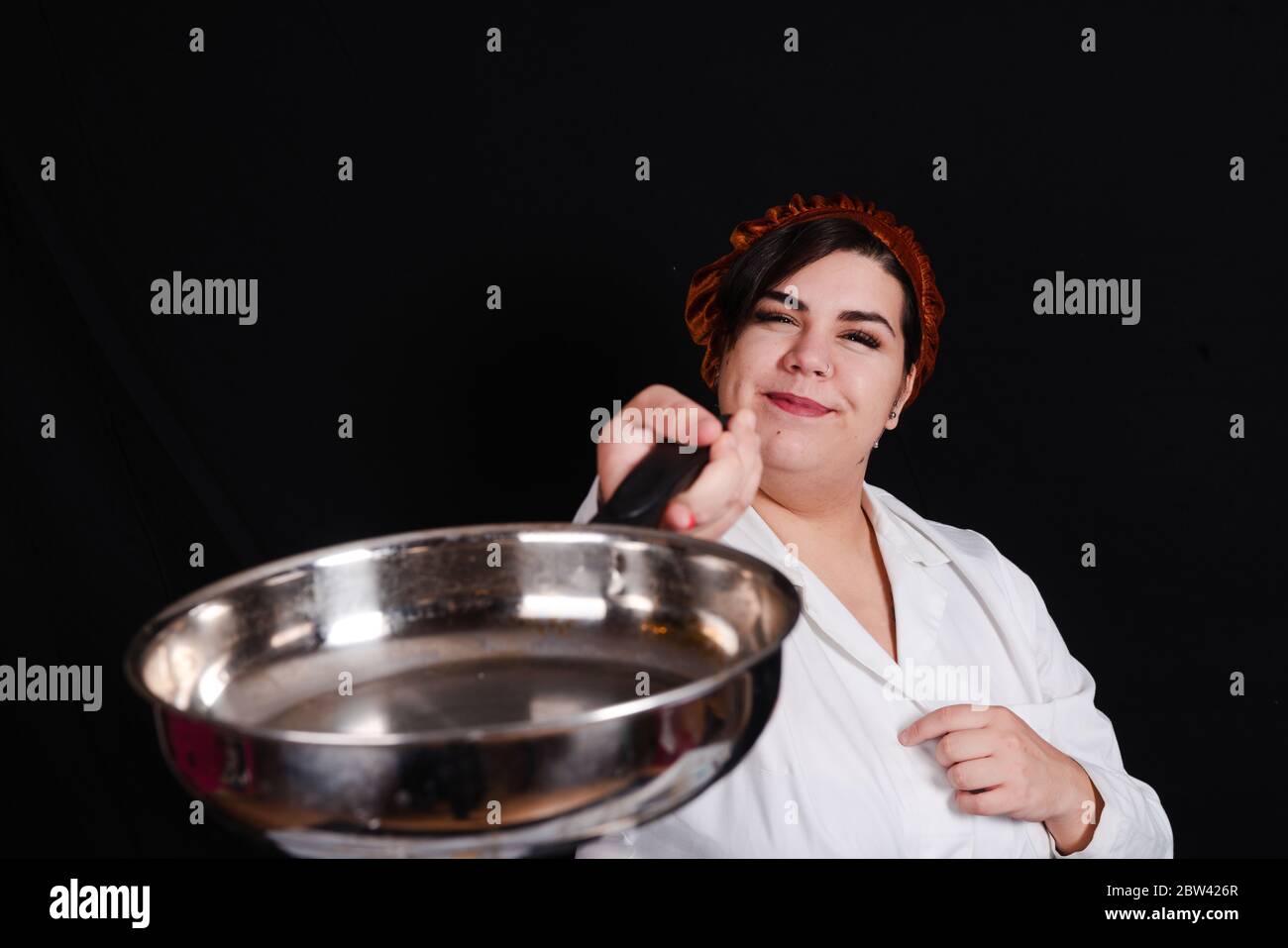 curvy chef girl prepairing food Stock Photo - Alamy