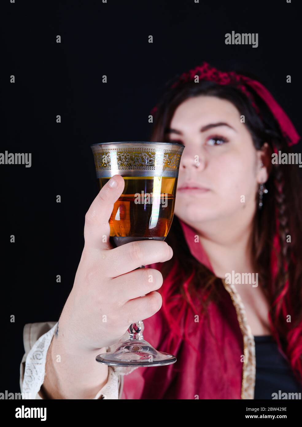 pirate girl with red jacket on the black background Stock Photo - Alamy
