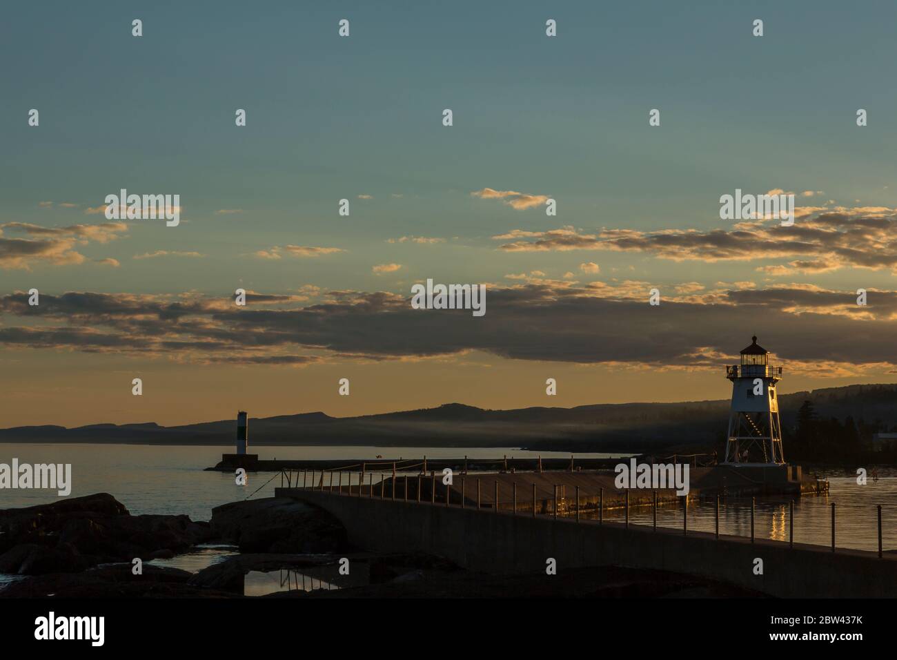 Grand Marais Lighthouse in the evening along Lake Superior Stock Photo ...