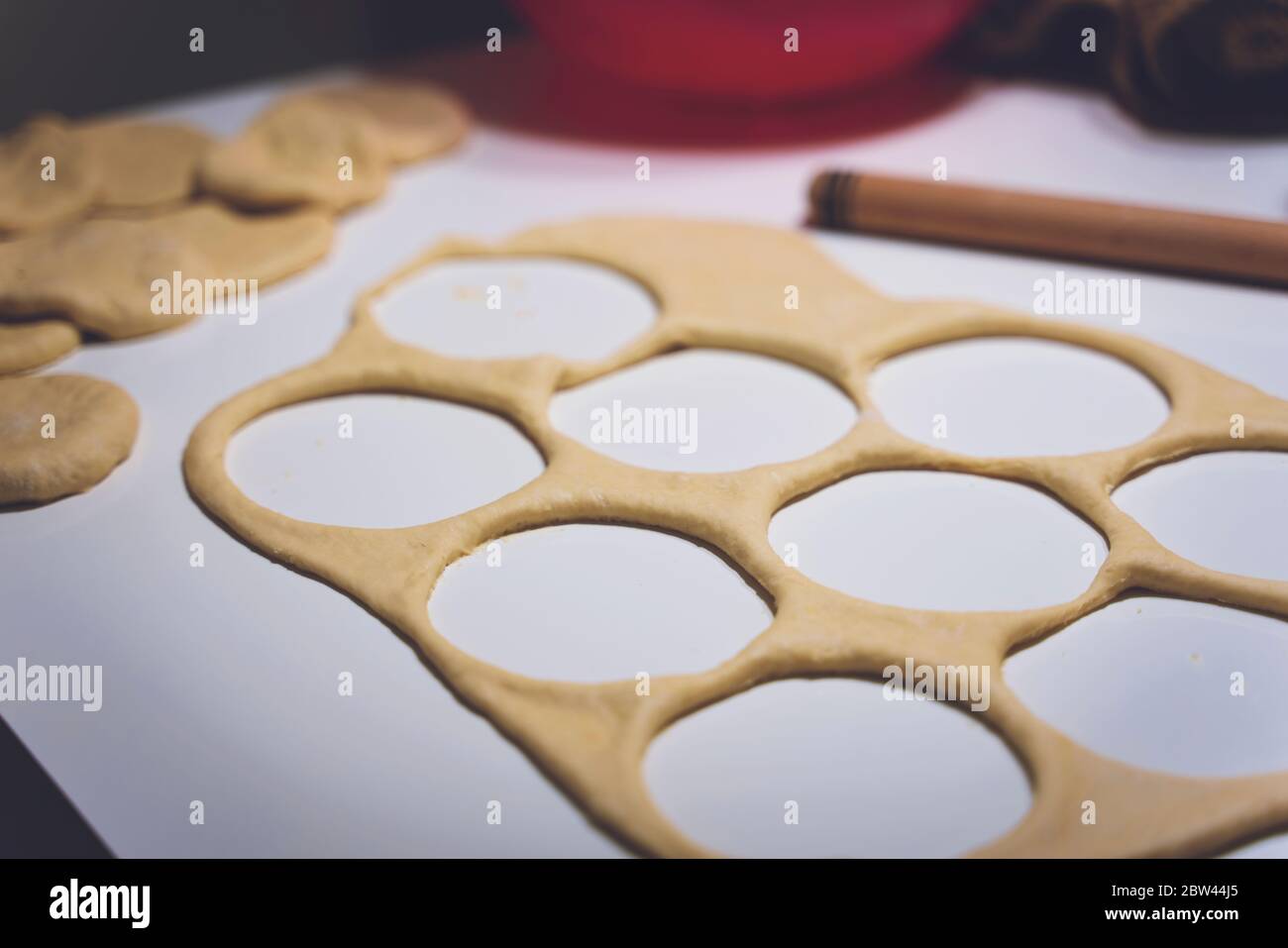 Making round shaped cookie dough and rolling pin mold Stock Photo - Alamy