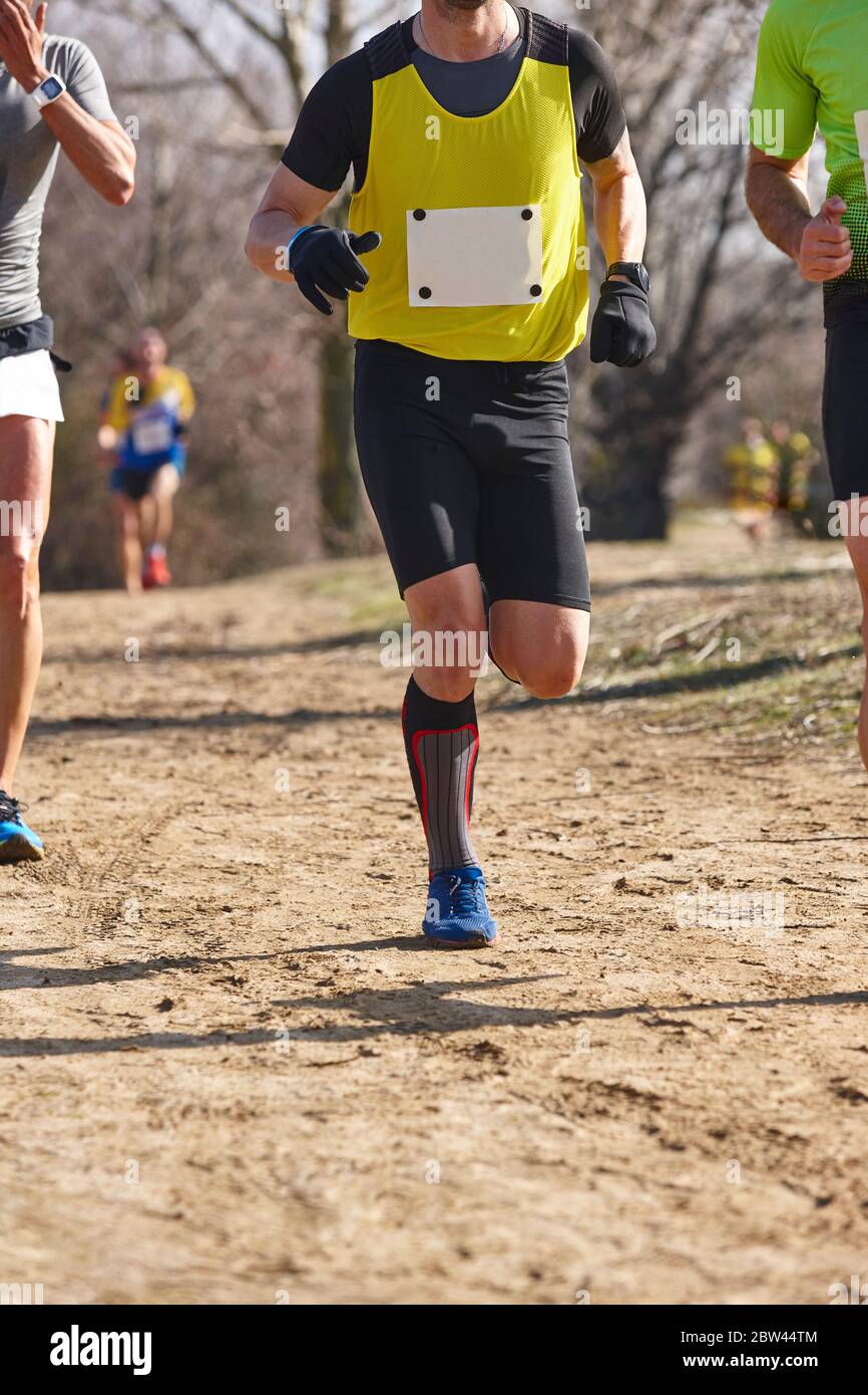 Cross country runners on a race. Active healthy outdoor lifestyle Stock ...