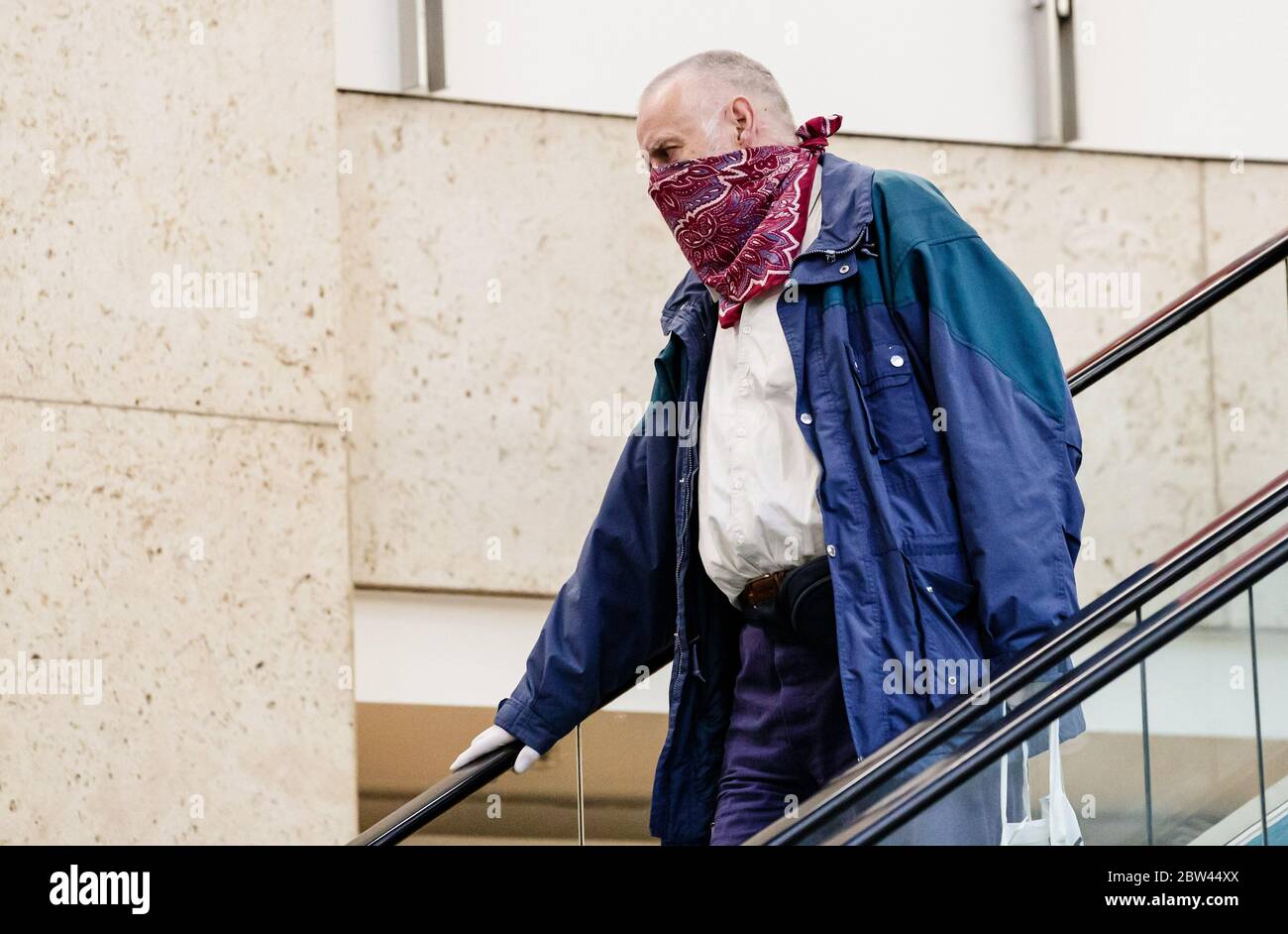 Berlin, Germany. 6th Apr, 2020. A man wearing a kerchief as ...