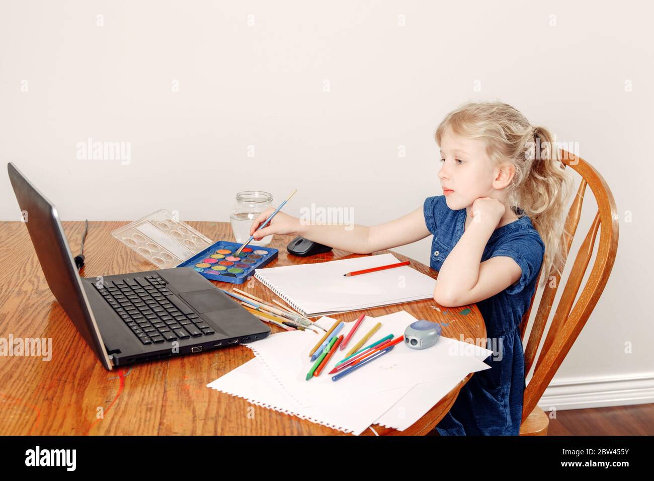 Girl child learning art lesson online on laptop Internet. Virtual ...