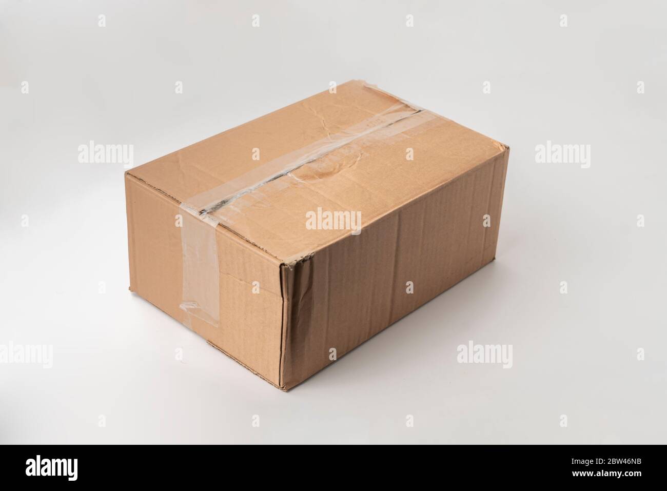 simple box delivery on color surface table, sending mail with things ...