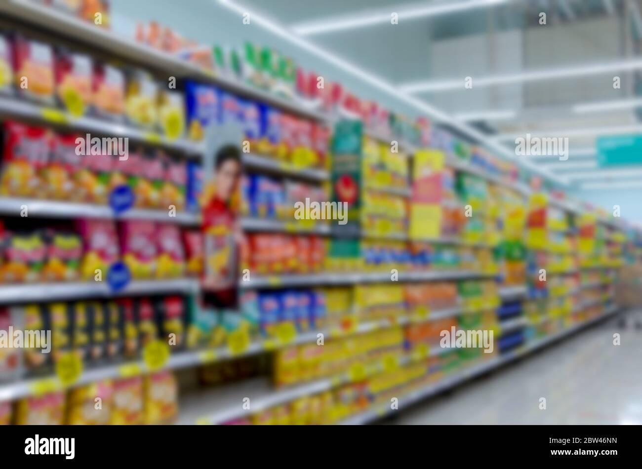 Supermarket blur the shelves for goods and food background Stock Photo ...