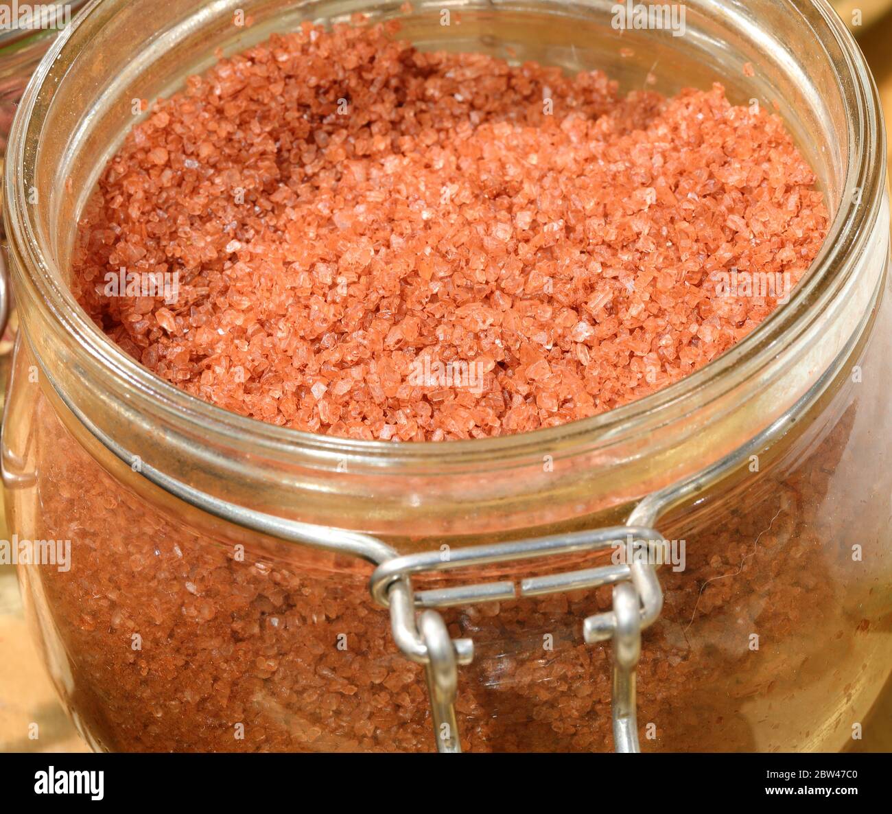 red himalayan salt on the jar for sale at asian store Stock Photo - Alamy