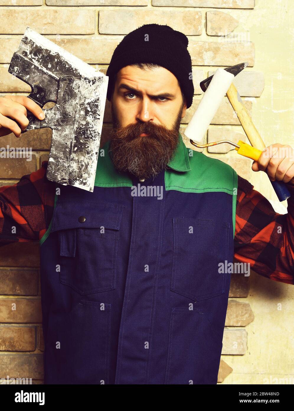 bearded builder man, long beard, brutal caucasian hipster with ...