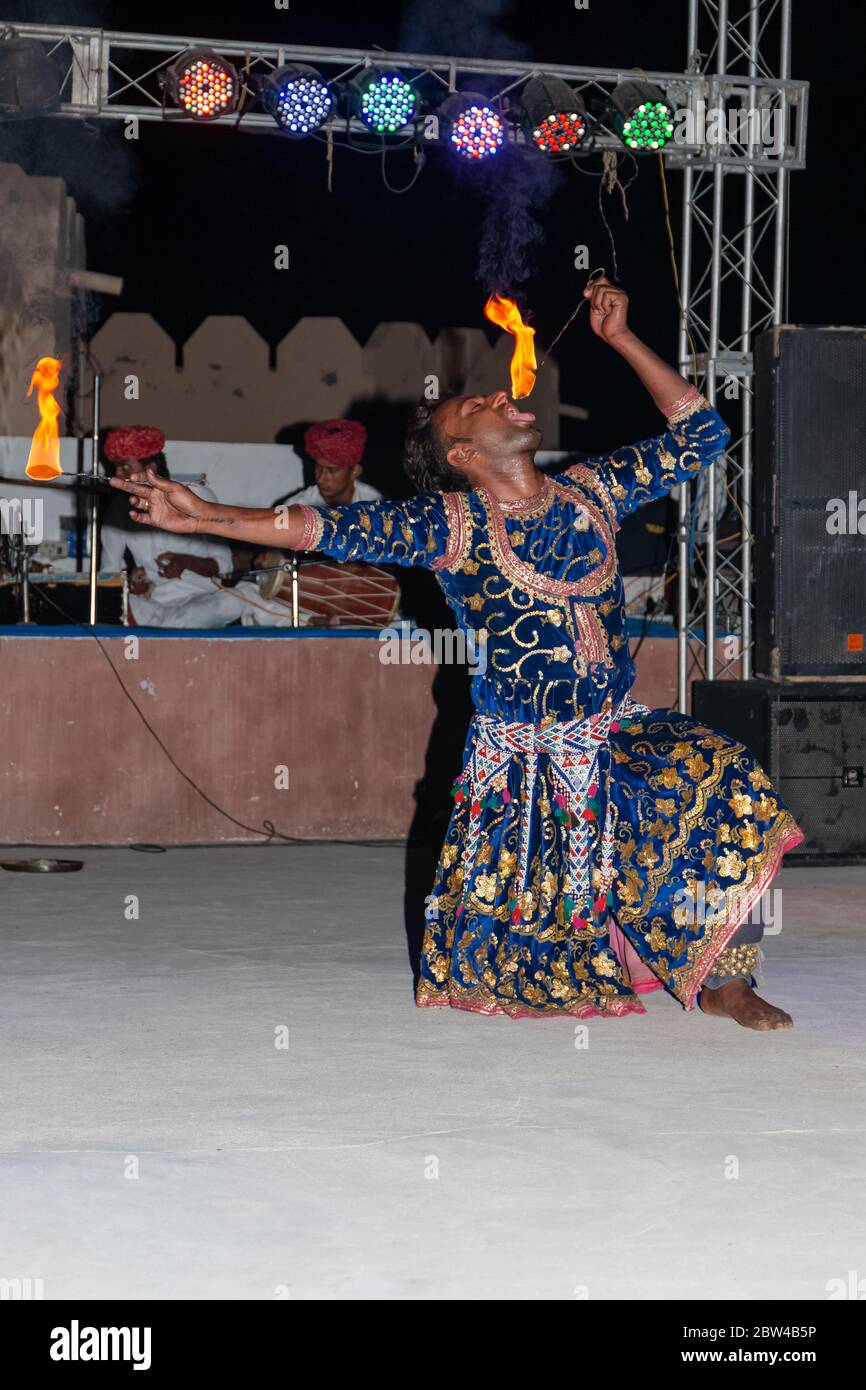 Fire Show, Man breathing fire and dancing with flame, Jaisalmer Stock ...