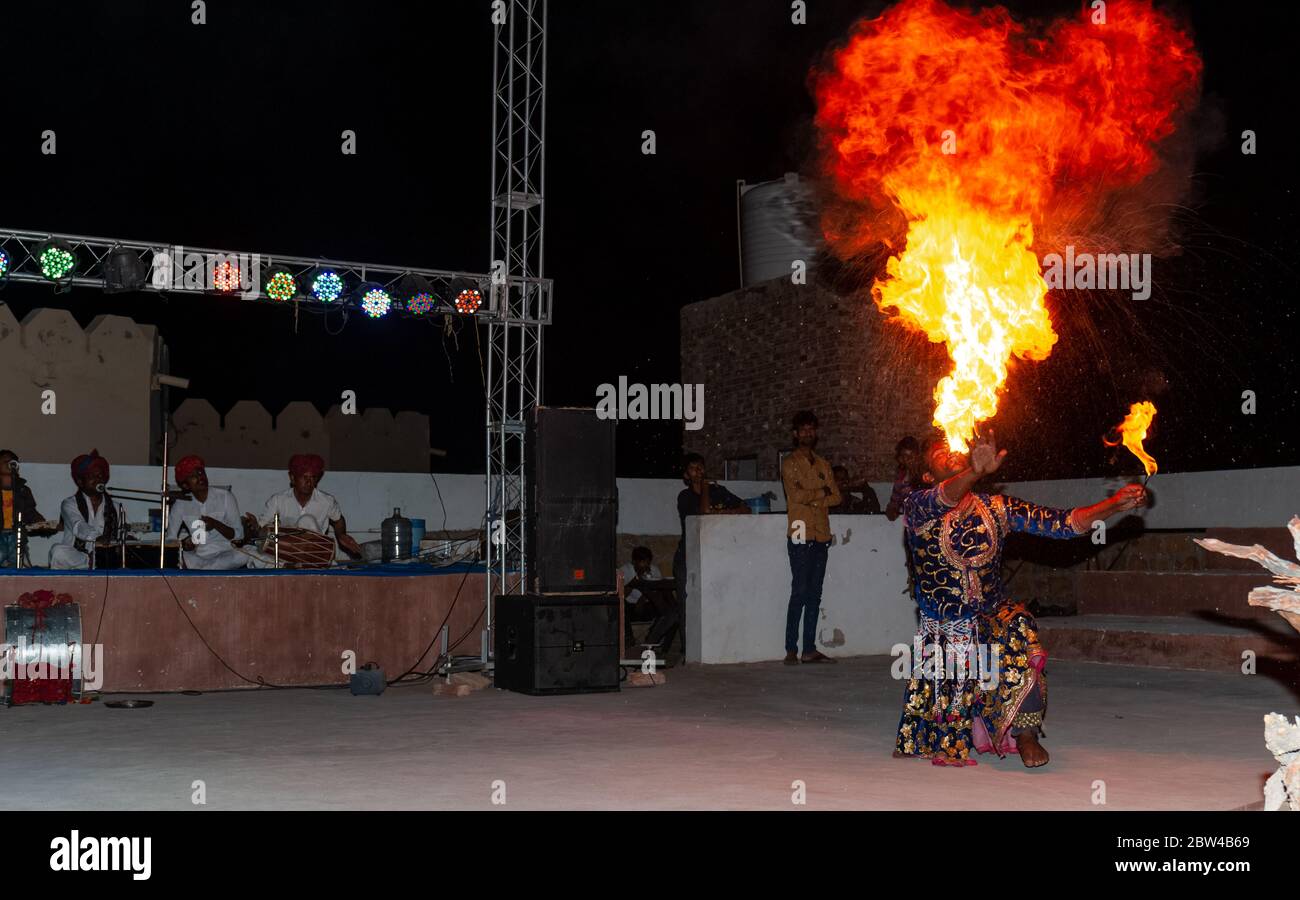 Fire Show, Man breathing fire and dancing with flame, Jaisalmer Stock ...