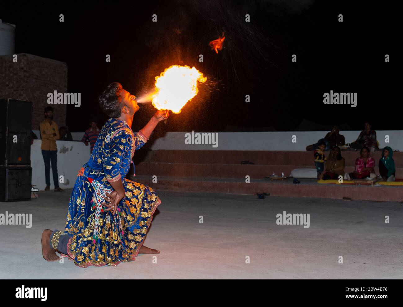 Fire Show, Man breathing fire and dancing with flame, Jaisalmer Stock ...