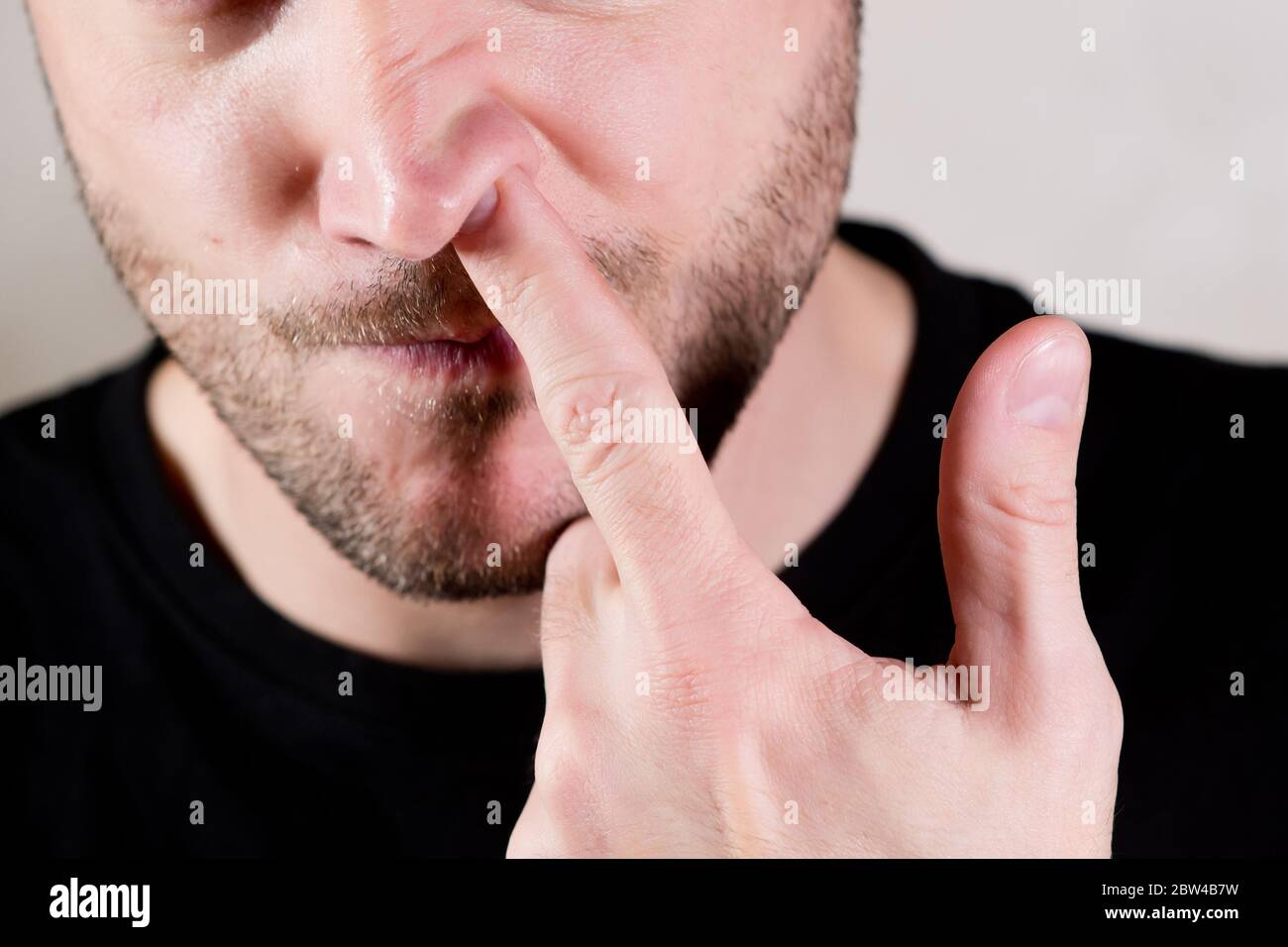 Finger nose hi-res stock photography and images - Alamy