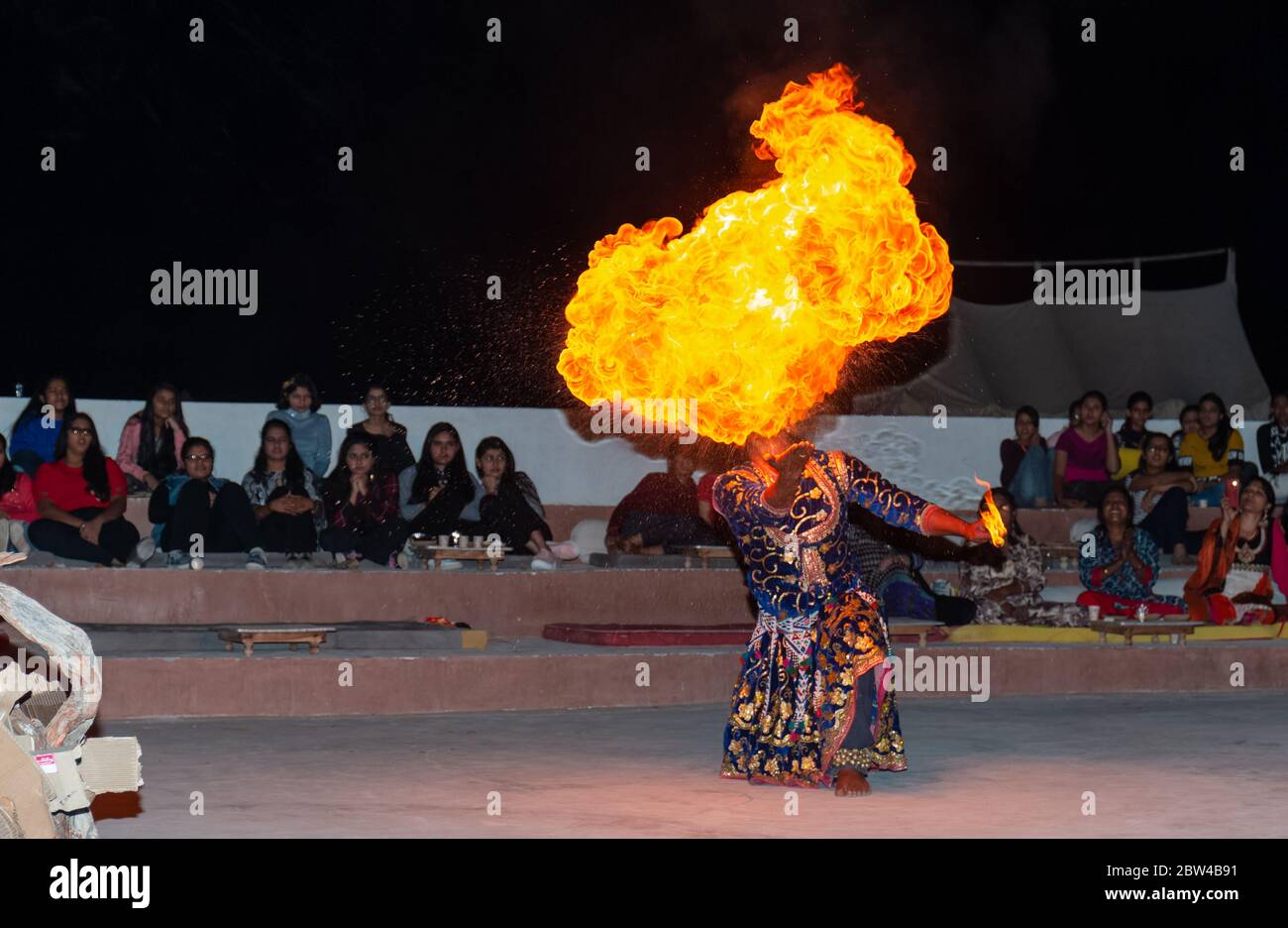 Fire Show, Man breathing fire and dancing with flame, Jaisalmer Stock ...