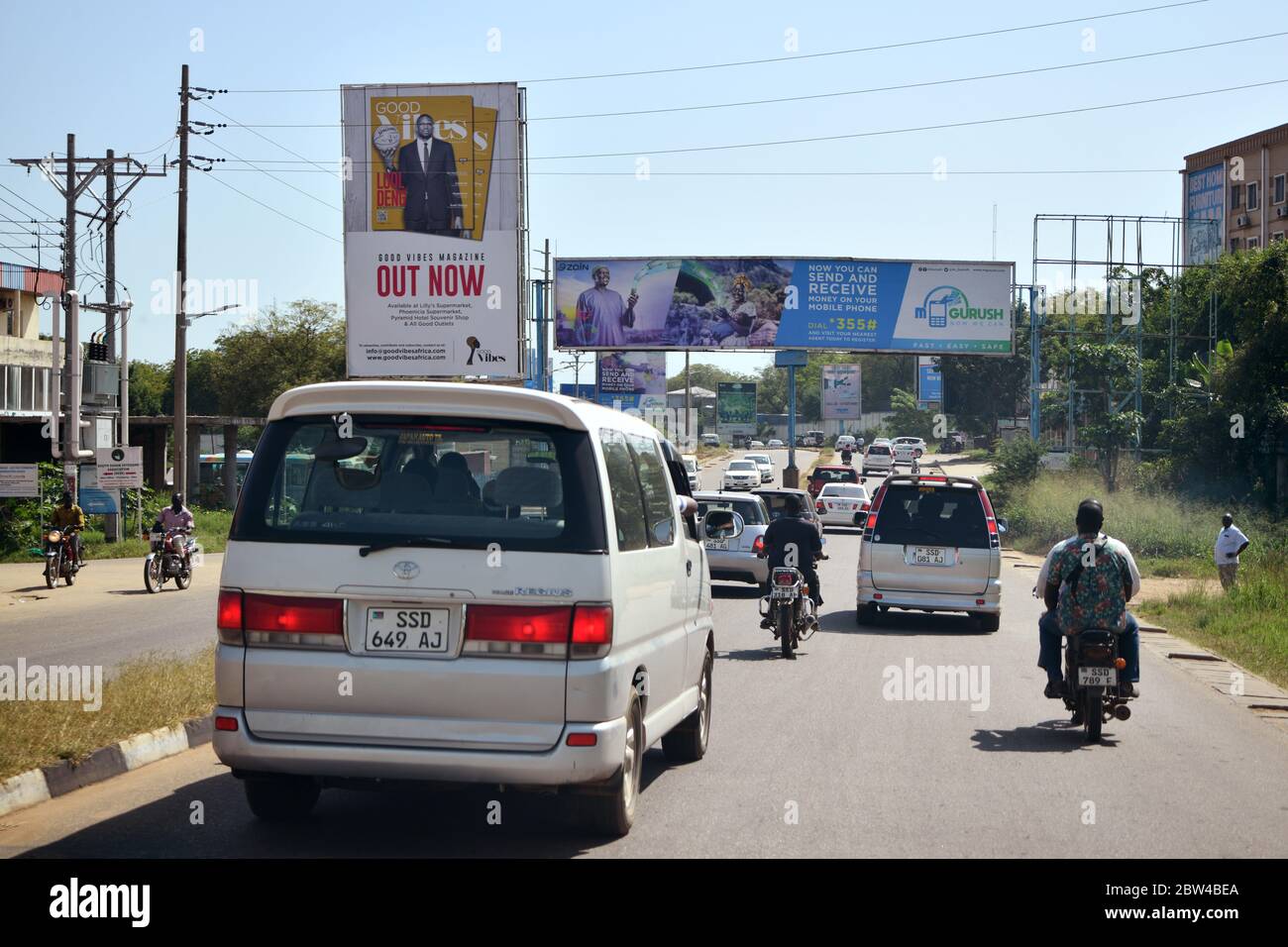 Large advertising posters on a busy main street in the South Sudanese ...