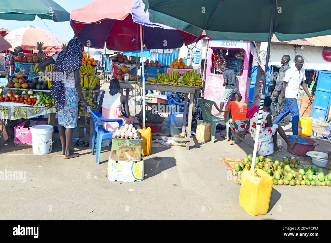 Fruits and vegetables are sold on a street in the South Sudanese ...