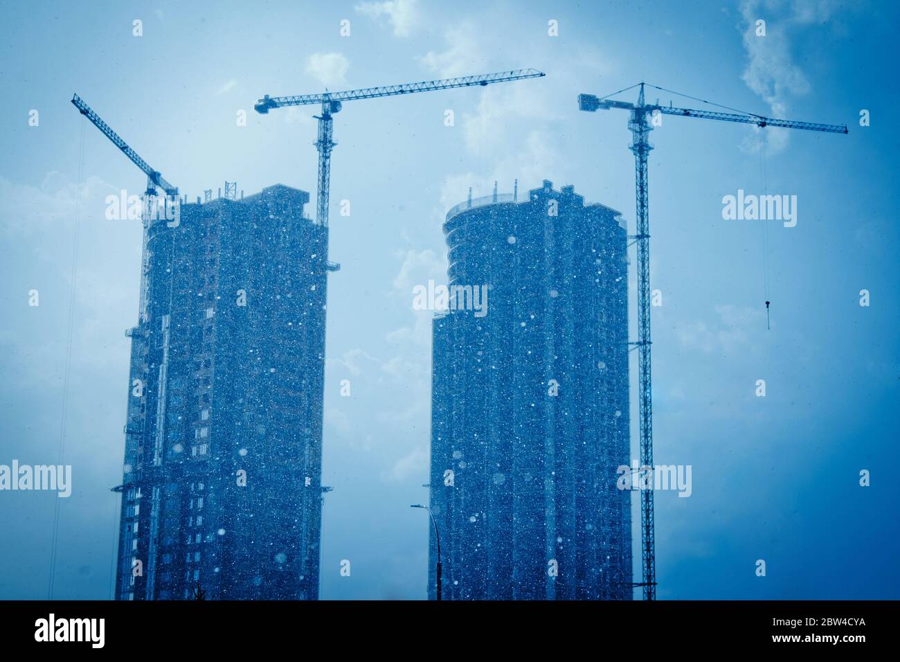 building a house in the rain in sunny weather Stock Photo - Alamy