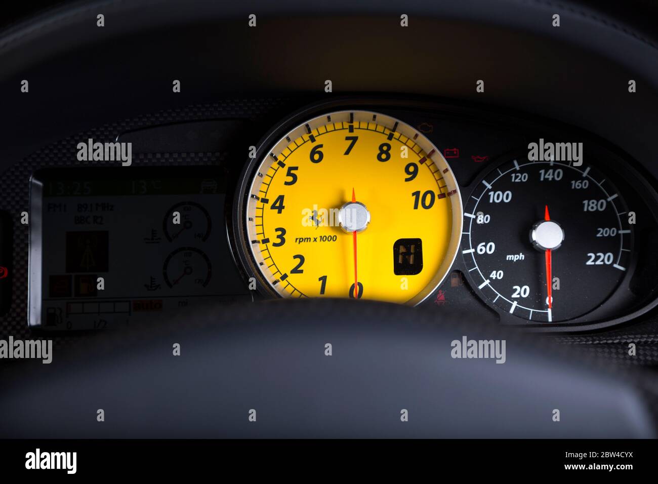 Close up of yellow Ferrari speedometer Stock Photo - Alamy
