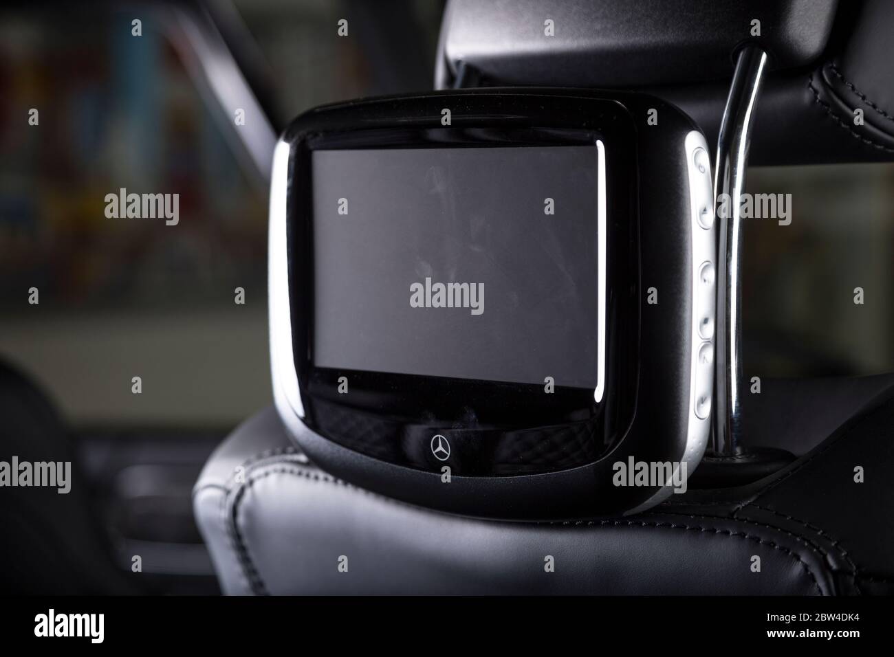 Media screen on passenger seat in a Mercedes car Stock Photo - Alamy