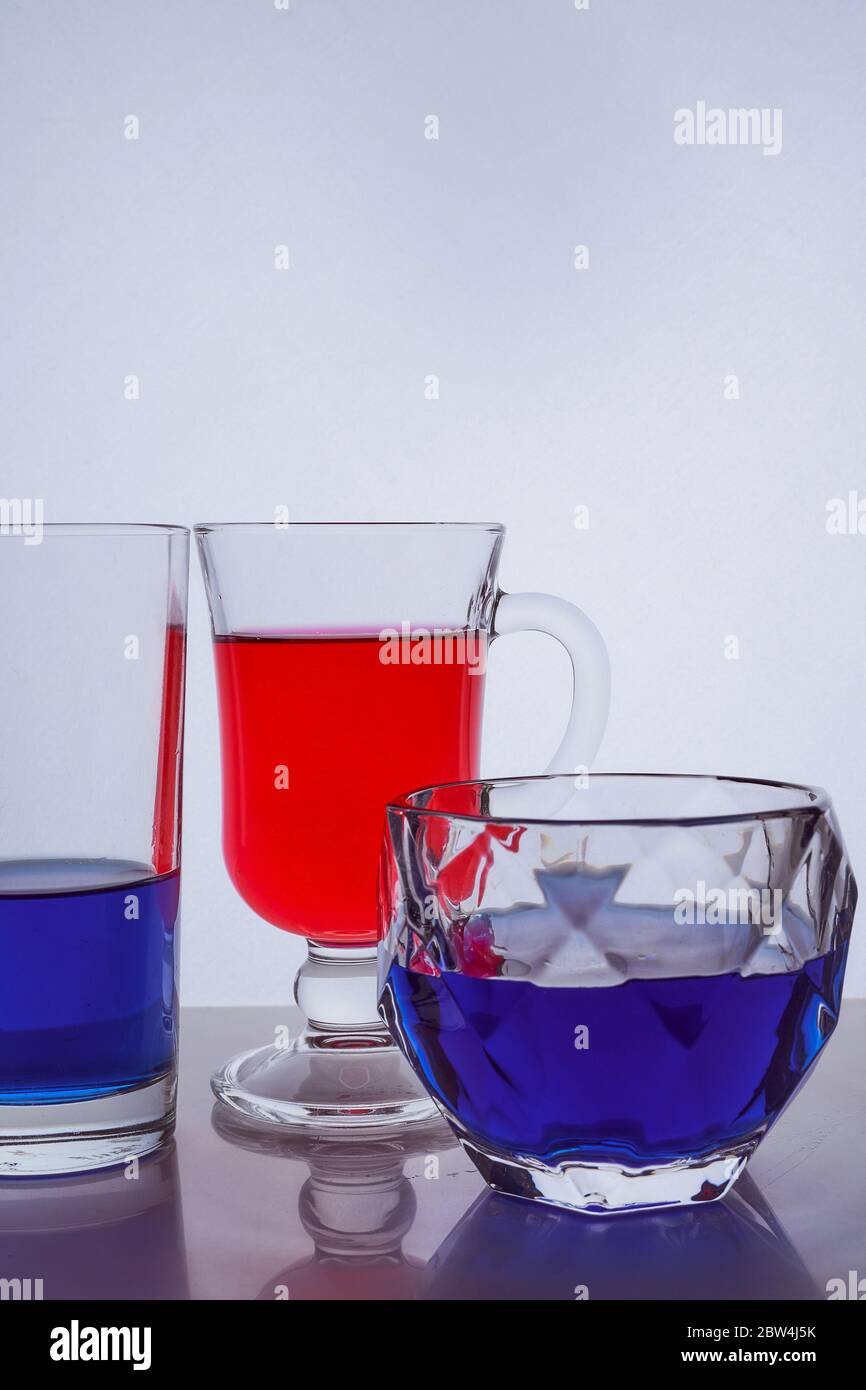 composition of different glass glasses on a white background with ...