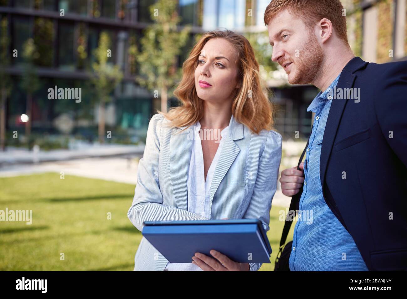 Male female coworkers planning hi-res stock photography and images - Alamy