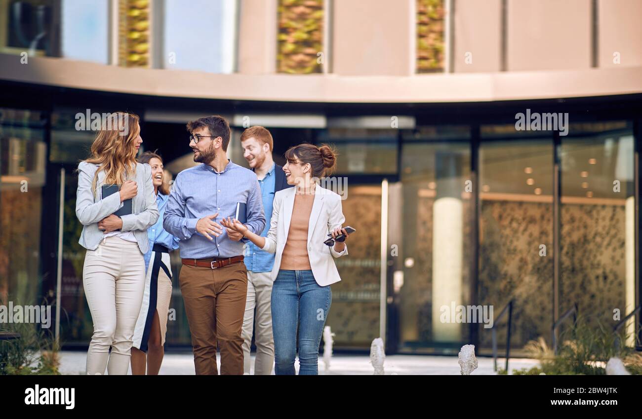 Large group of people outside of a building hi-res stock photography ...