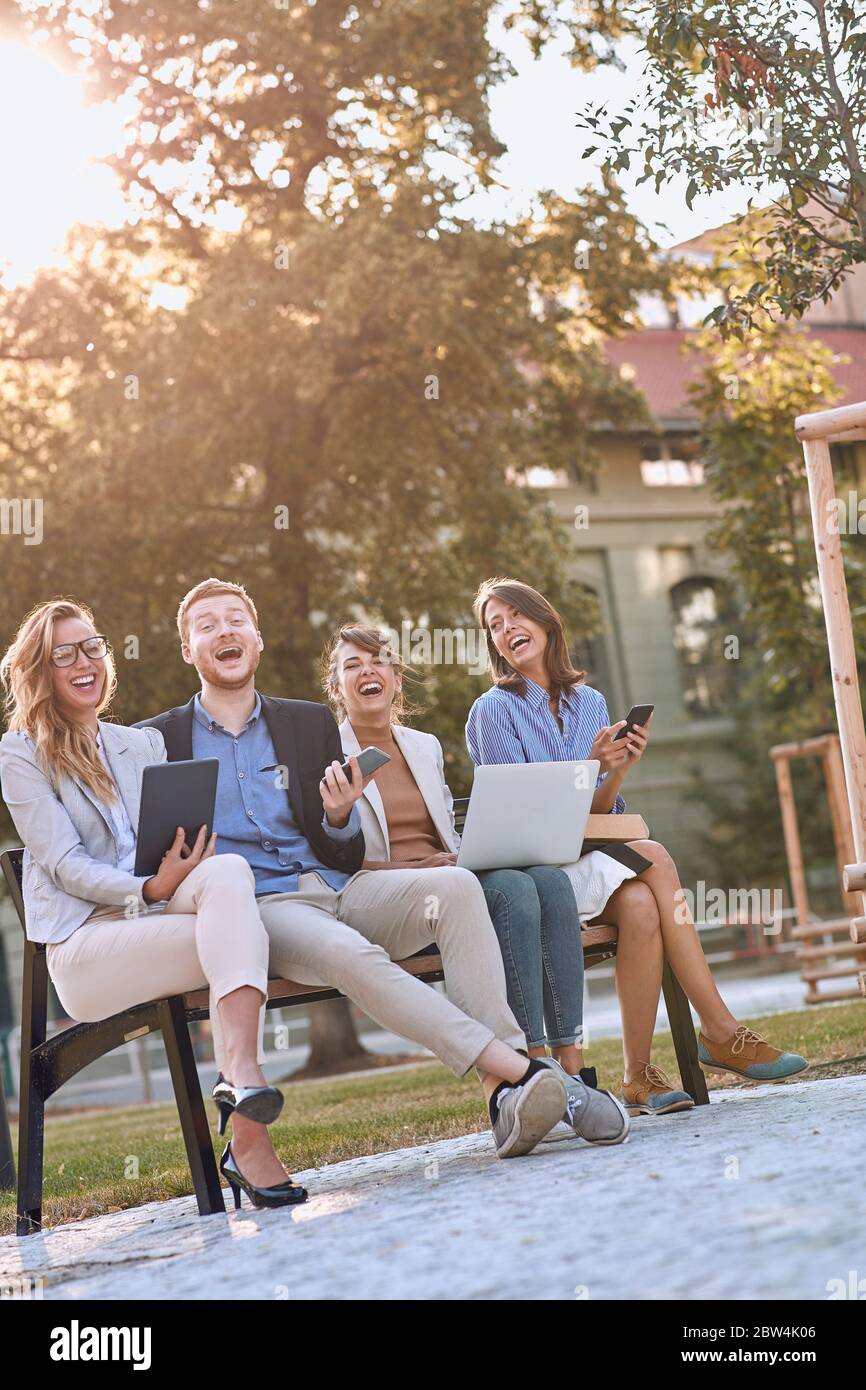 Professional colleagues walking outside hi-res stock photography and ...