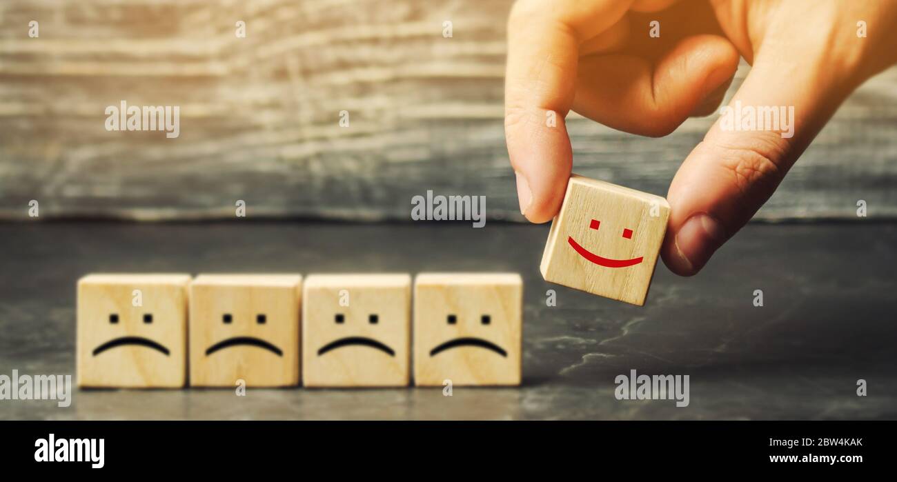 One block with a positive face stands out from the rest of the negative ...