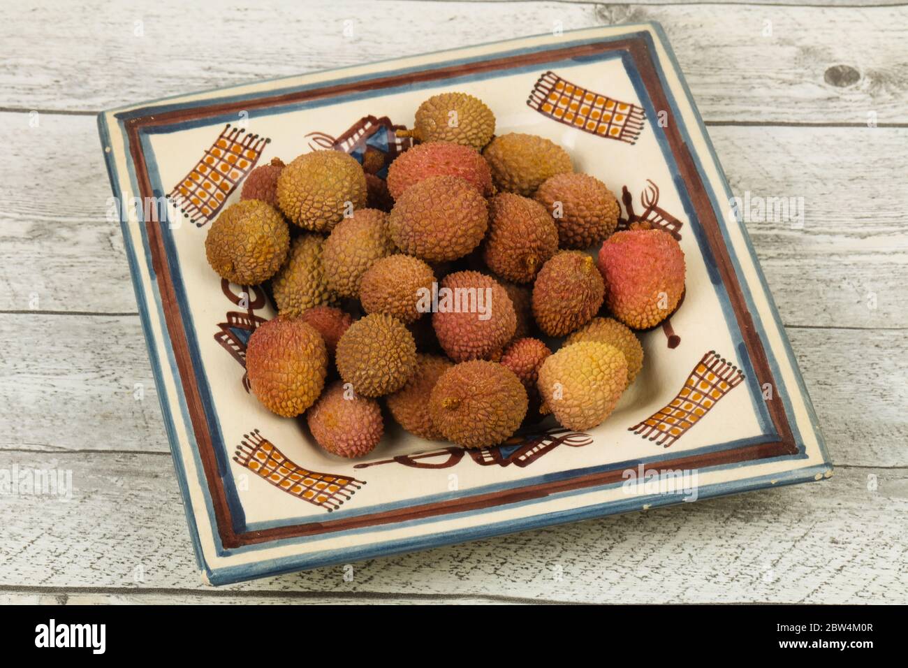 Tropical fruit lychee in the bowl Stock Photo - Alamy
