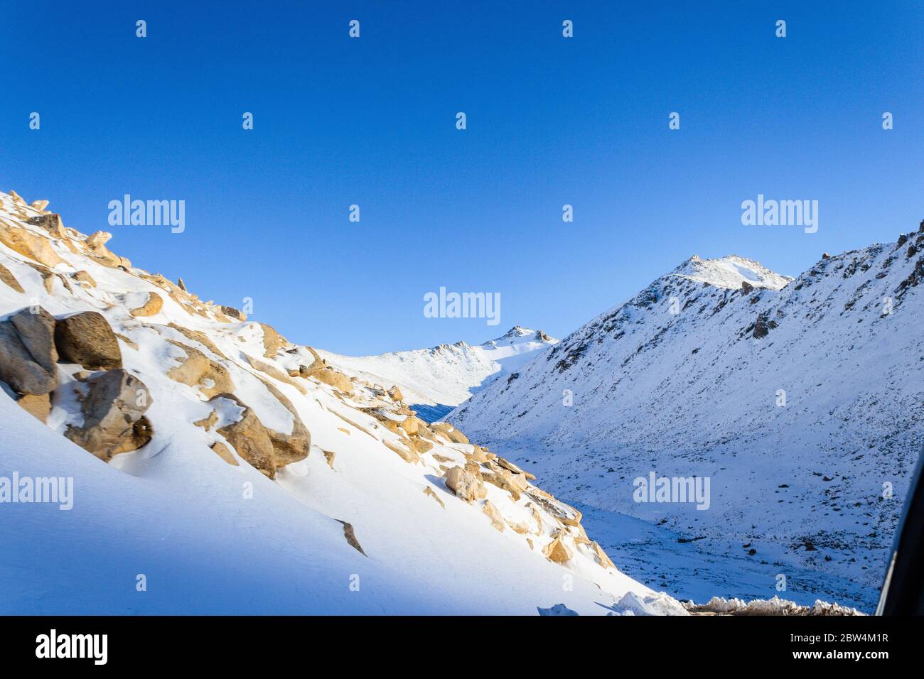 Cold winter roads covered with snowy mountains in Ladakh, India ...