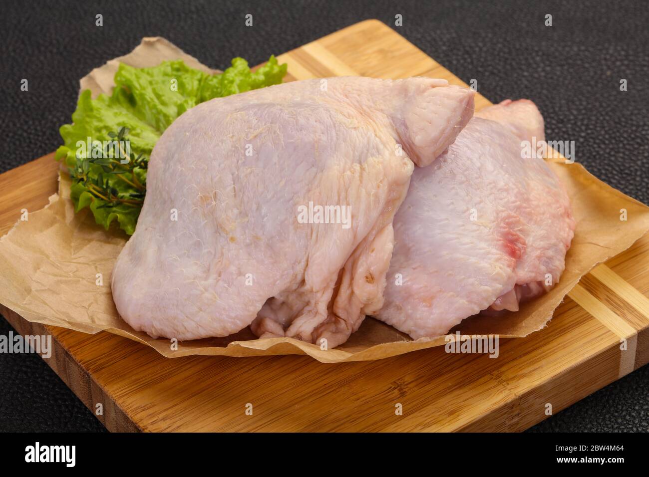 Raw chicken hip ready for cooking Stock Photo - Alamy
