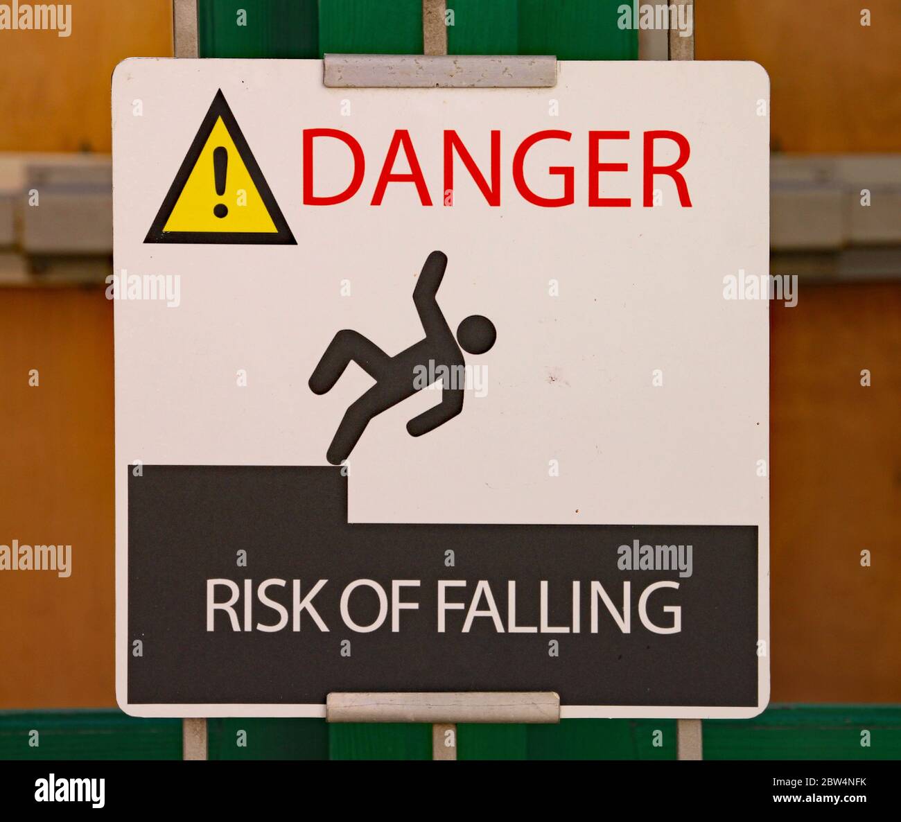 Road sign warning of danger through risk of falling Stock Photo - Alamy