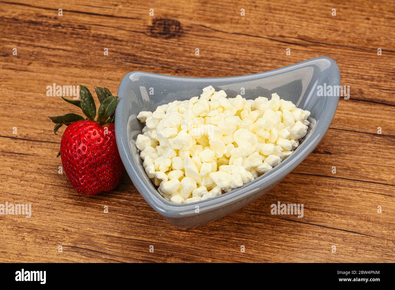 Dietary food - grain cottage cheese in the bowl Stock Photo - Alamy