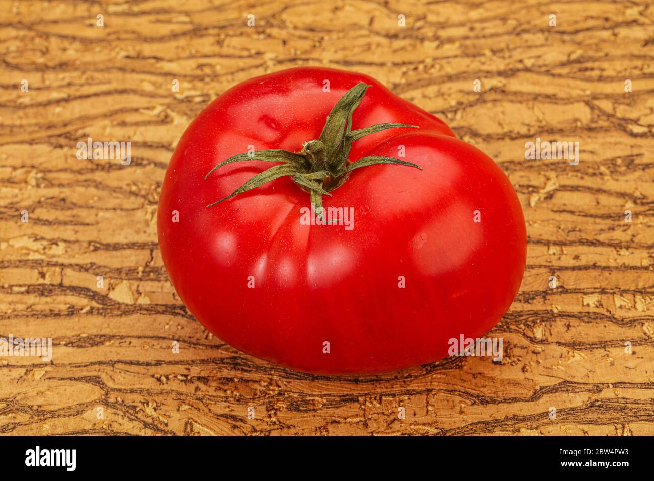 Ripe tasty red big tomato over background Stock Photo - Alamy