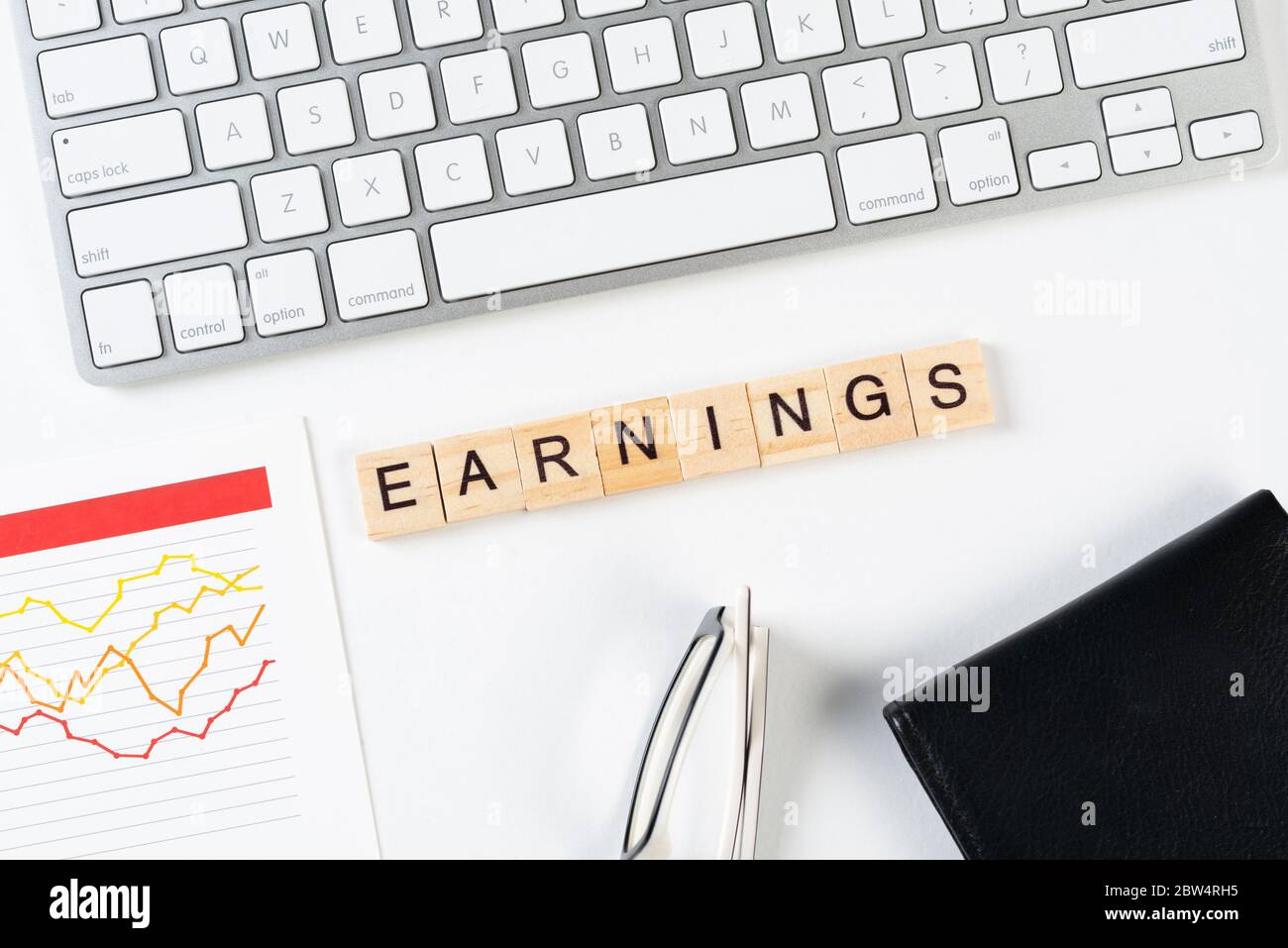 Earnings management concept with letters Stock Photo - Alamy