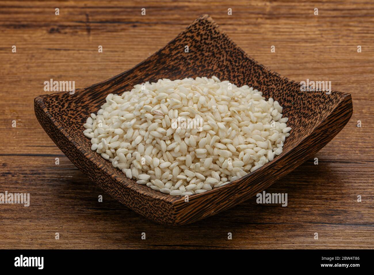 Raw Italian arborio rice for Risotto Stock Photo - Alamy