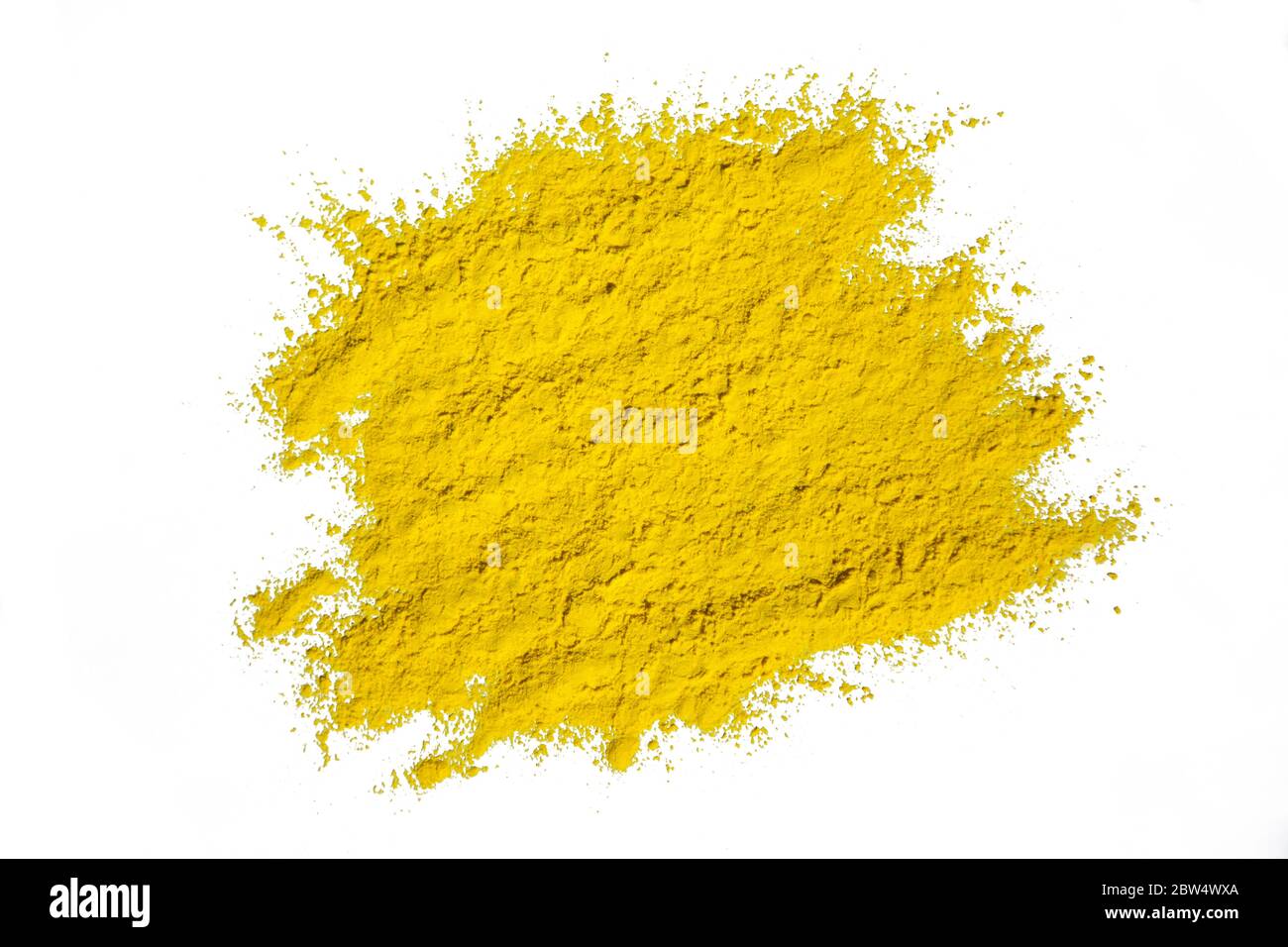 Abstract background of yellow dry powder paint. Copy space in a center ...