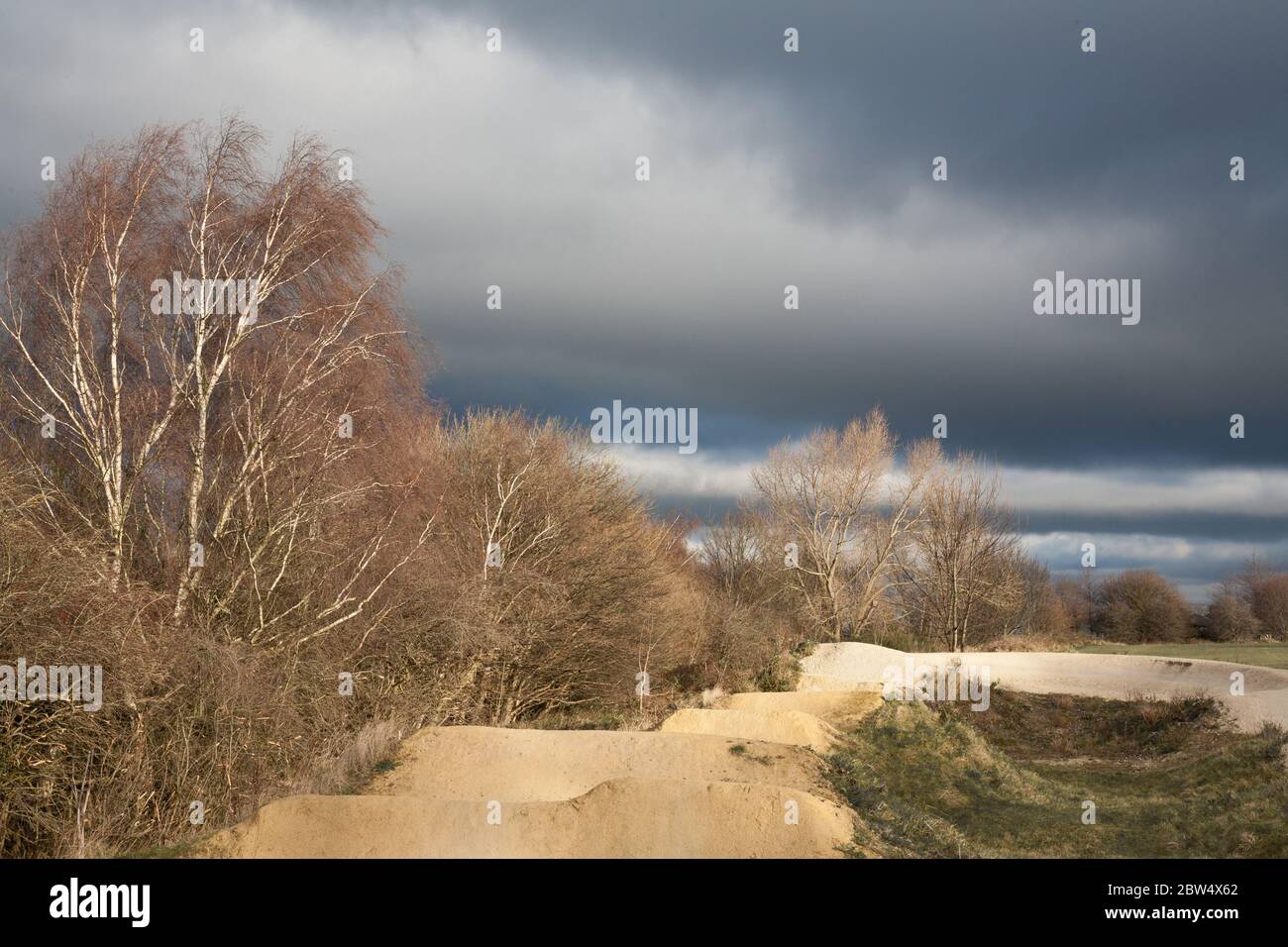 Mountain bike track with rollers and berm Stock Photo - Alamy