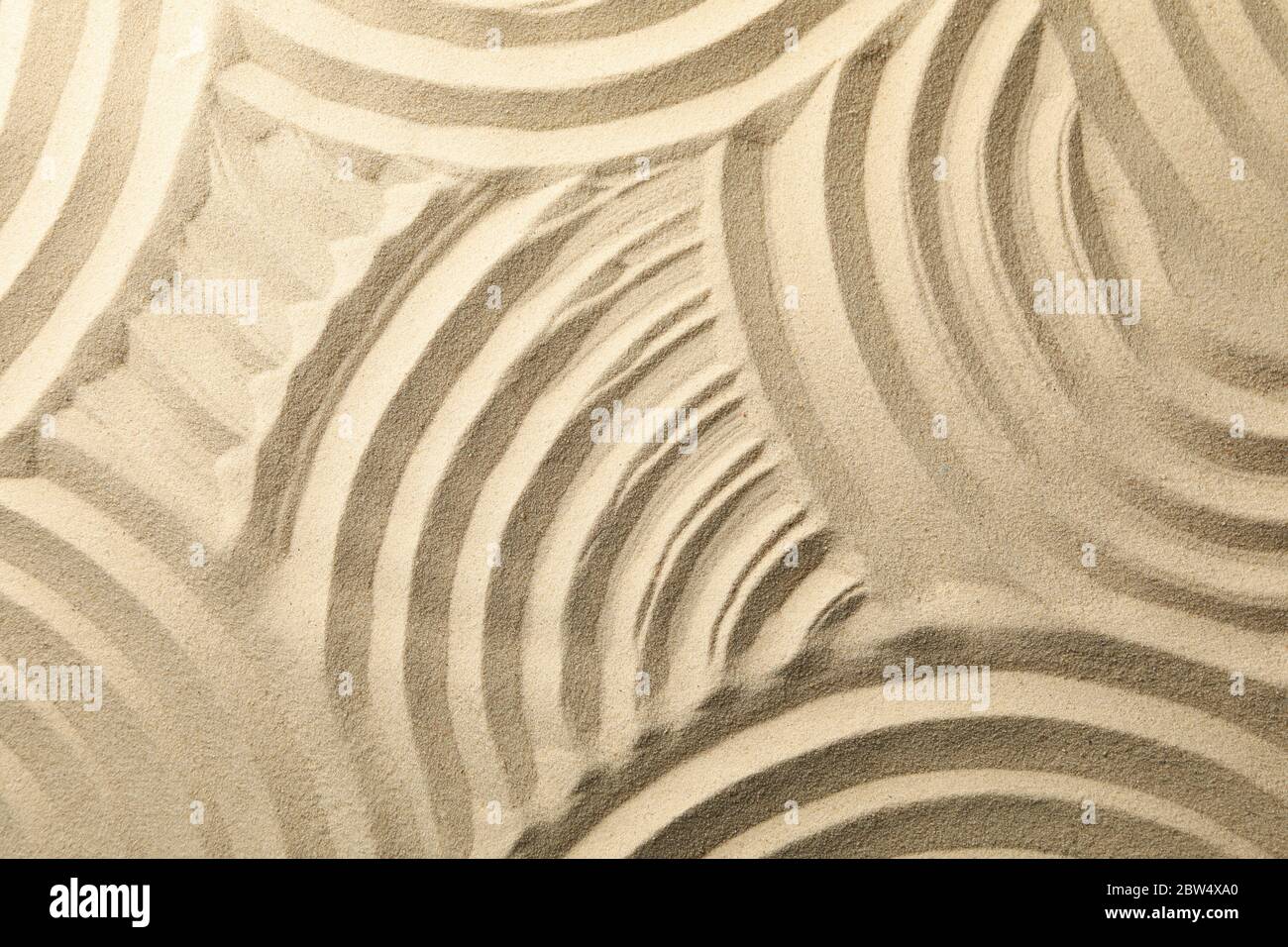 Sand background with patterns, top view. Zen concept Stock Photo - Alamy
