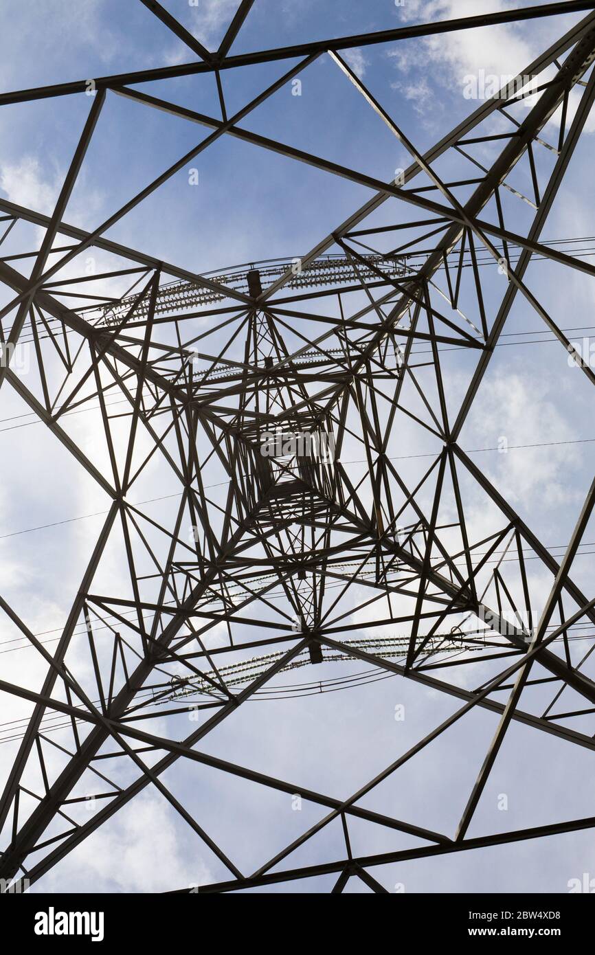 Steel lattice structure of a high voltage electricity pylon creates a ...