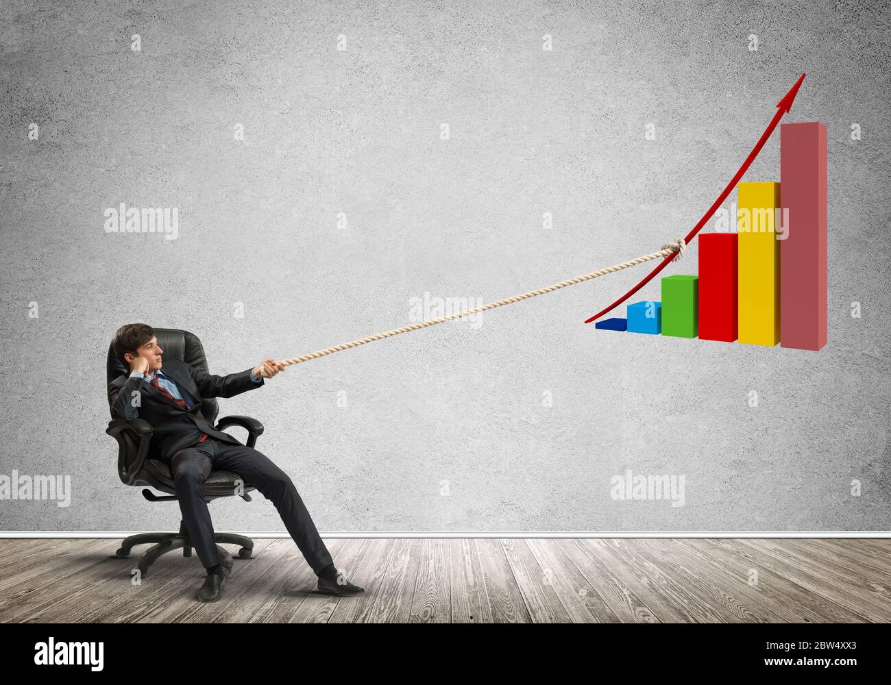 Businessman pulling graph with rope as concept of power and control ...