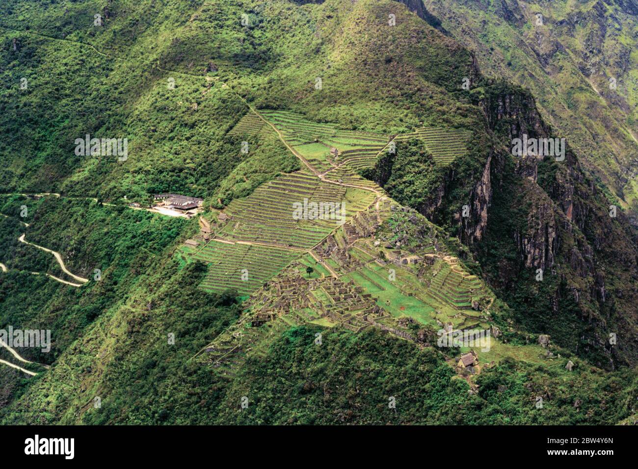 Forested cliffs with agricultural terraces and old houses in the ...