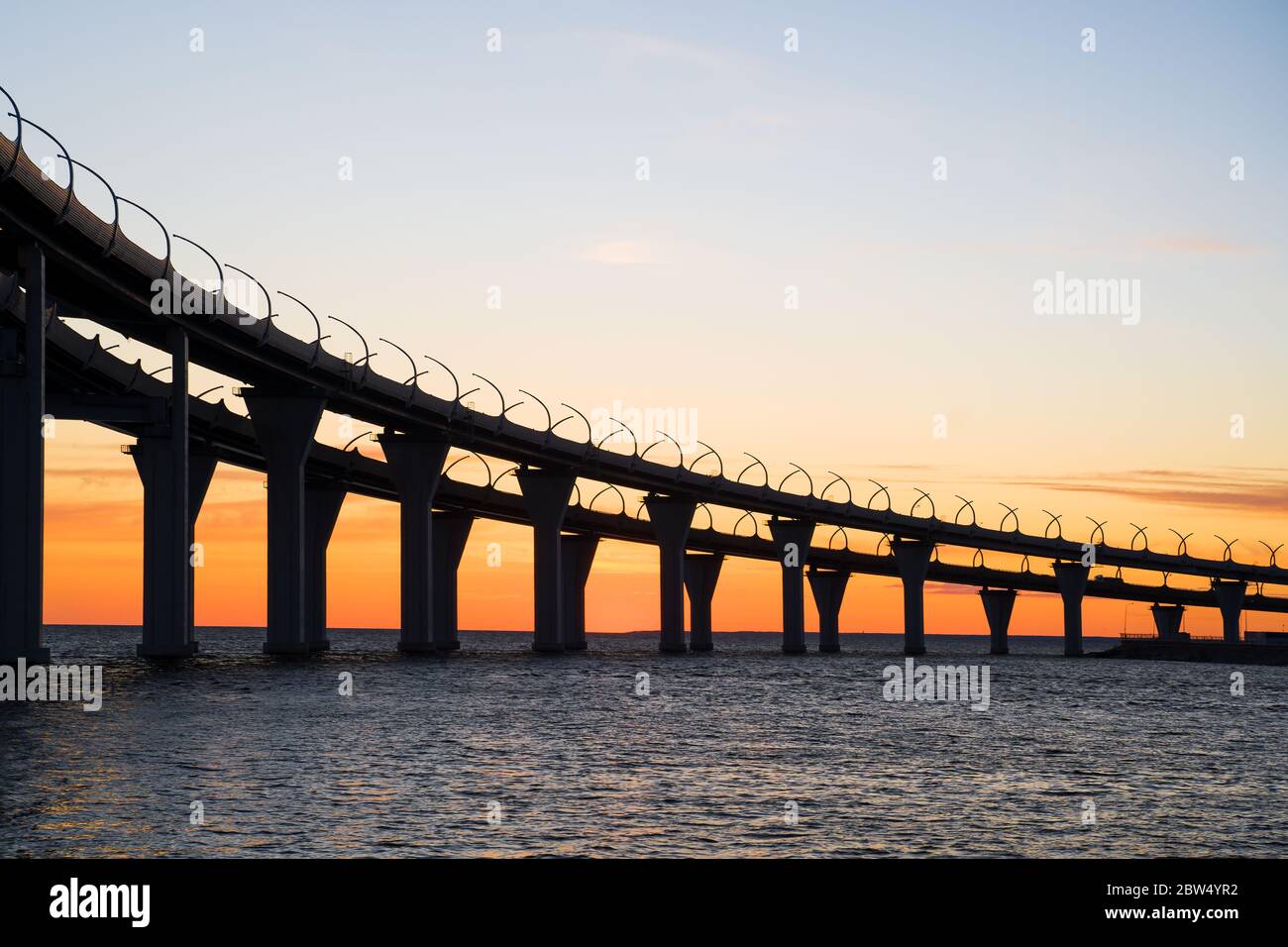 Highway Bridge At beautiful Sunset. Orange Sunset Stock Photo - Alamy