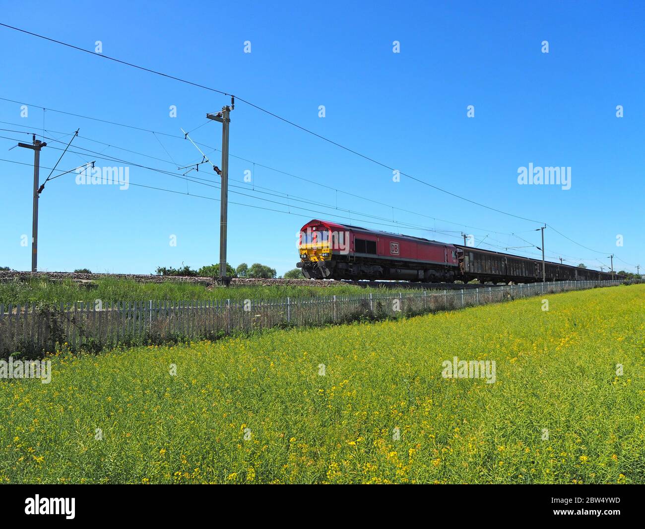DB Schenker Class 66 Locomotive 66128 Leads a Freight Train Past ...