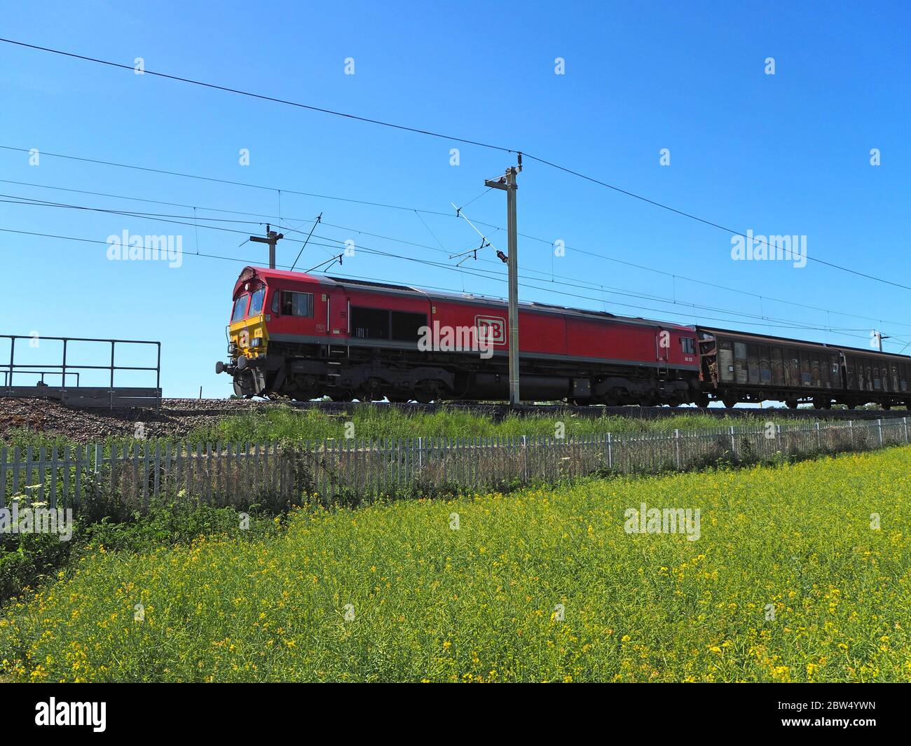 DB Schenker Class 66 Locomotive 66128 Leads a Freight Train Past ...