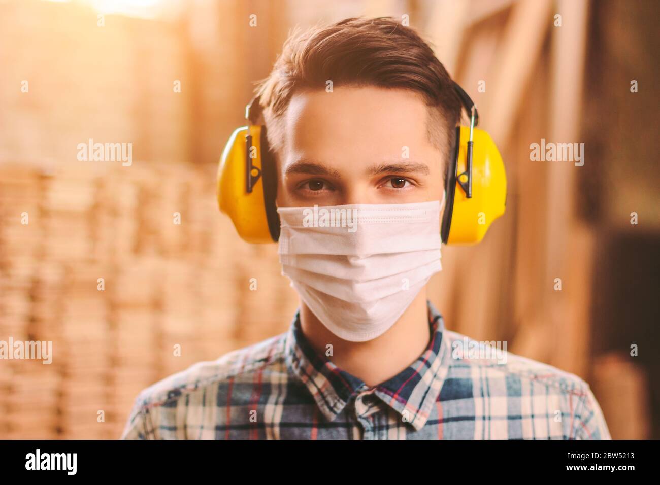 Confident carpenter in face mask hi-res stock photography and images ...