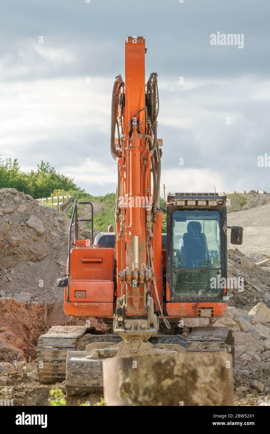 Red excavator hi-res stock photography and images - Alamy